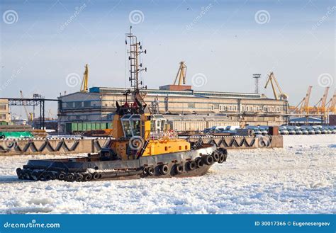 Small Tug Boat Goes On Icy Channel Stock Photo Image Of Mooring Pier