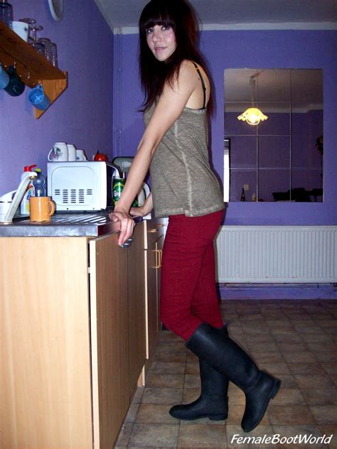 Cute Rebecca In Rubber Riding Boots