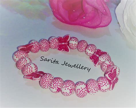 Принцеса Представяме Ви новата Ни и уникална гривна мартеница с пеперудки и бели мъниста на