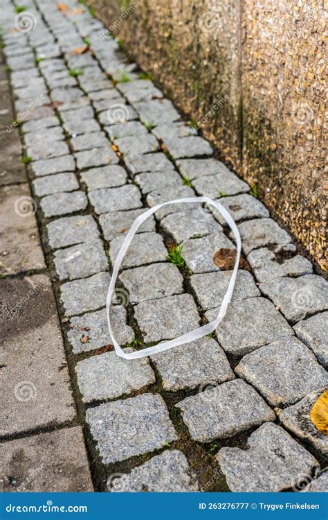 Plastic Loop Left On The Street Representing A Danger For Pedestrians Stock Image Image Of