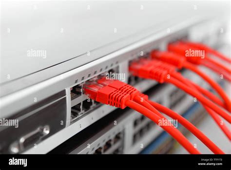 Red Ethernet Cables Connected To Network Switch Close Up Stock Photo Alamy