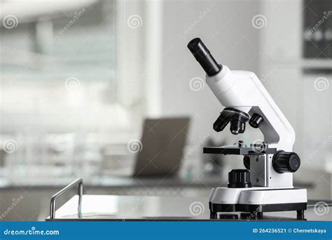 Modern Medical Microscope On Metal Table In Laboratory Space For Text Stock Image Image Of