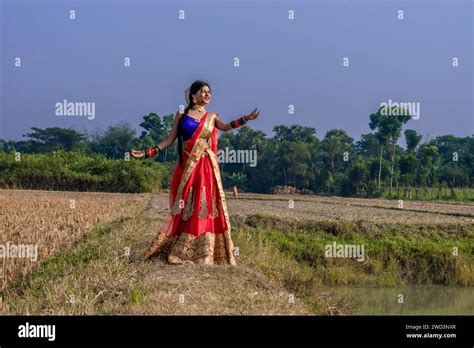 Indian Rural Girl Smiling And Enjoying Nature Freedom Concept Stock