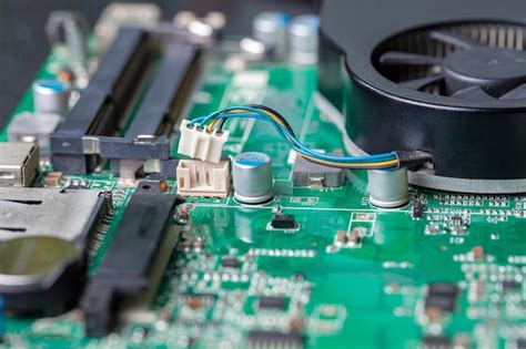 Premium Photo Installing Computer Processor To Motherboard Concept Repair Of Pcb With Pcb On A
