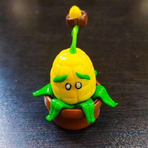 خرید و قیمت فیگور مجسمه بازی زامبی ذرت خمیر گل چینی از غرفه هنری ساز