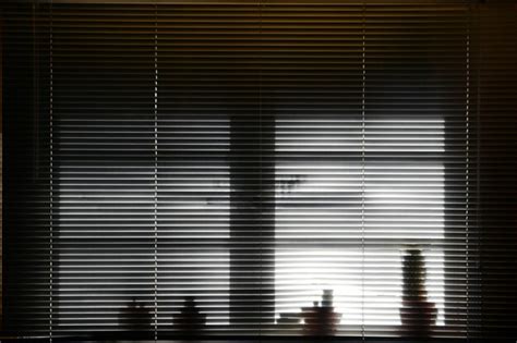 Premium Photo Closed Windows Viewed Through Blinds