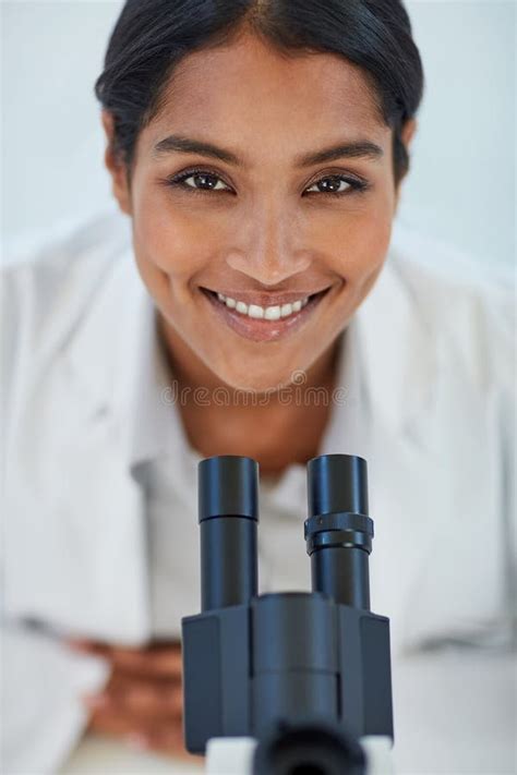 Scientist Microscope And Portrait In Laboratory For Research Study