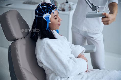 Attractive Calm Lady Undergoing An EEG Test Stock Photo By Iakobchuk