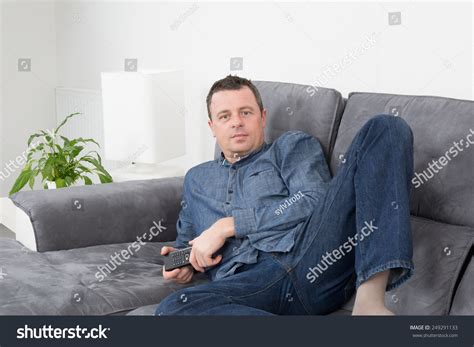 Charming Man Lying On Couch Stock Photo Shutterstock