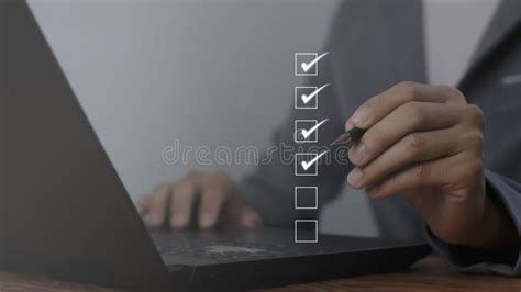 Businessman Making Valid Marks For Document Approval Questionnaire