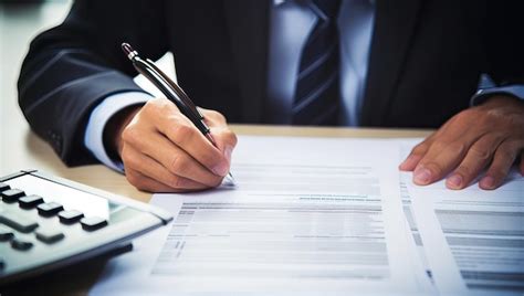 Premium Ai Image Businessman Analyzing Investment Charts Accountinginvestment Concept