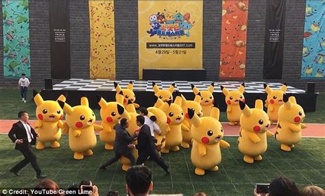 Pikachu Wrestled Off Stage After His Outfit Deflates Daily Mail Online
