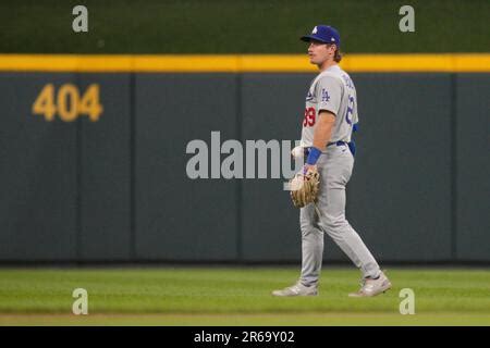 Los Angeles Dodgers Jonny Deluca Sits In The Dugout During In The Ninth Inning Of A Baseball