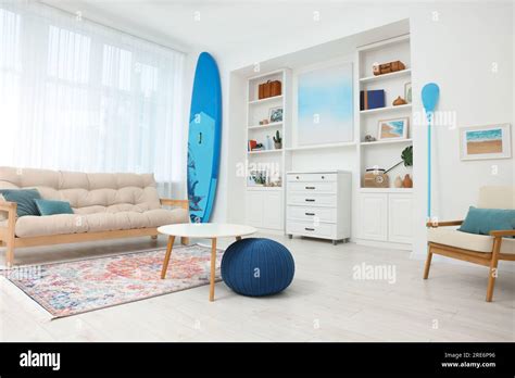 Sup Board Shelving Unit With Different Decor Elements Table And Pouf