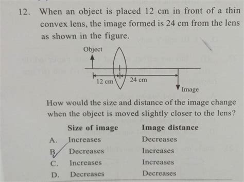 when an object is placed 12 cm in front of a thin convex lens the image