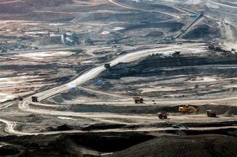 Premium Photo Part Of A Pit With Big Mining Truck Working
