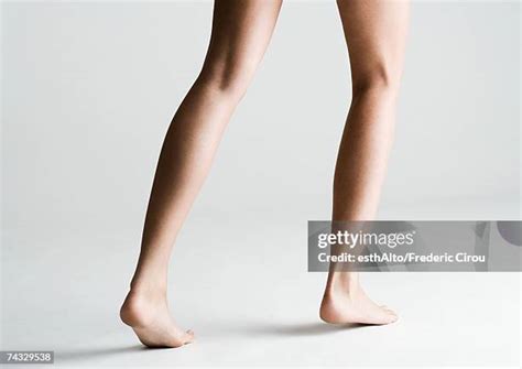 Womans Legs Standing Bare Feet Photos And Premium High Res Pictures
