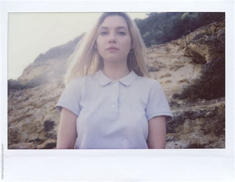 Pretty Girl In T Shirt Looking At Camera By Stocksy Contributor