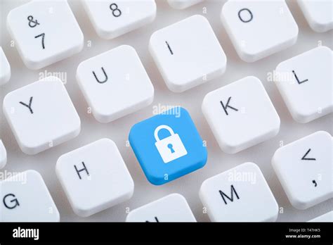 Computer Keyboard With Blue Lock Button Computer Security Concept Stock Photo Alamy