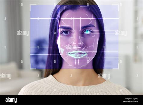 Facial And Iris Recognition System Woman Undergoing Biometric