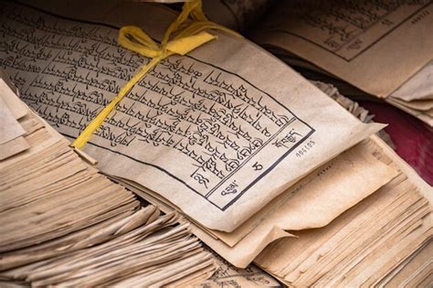 Premium Photo Printed Sheets Of Tibetan Abugida Script Prayer Verses