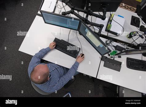 Top View Of Software Developer Writing Programming Code On Computer