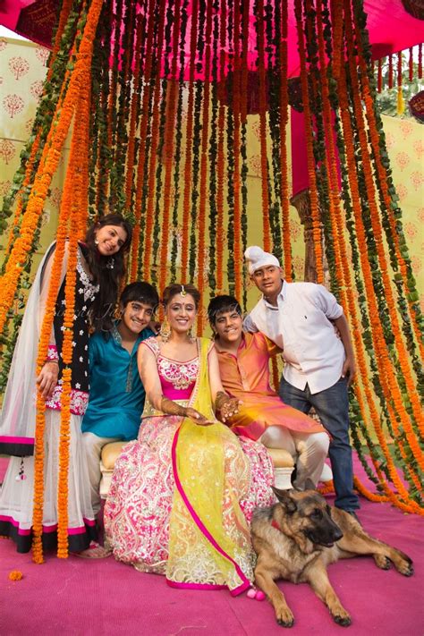 Orange And Pinkk Vibrant Mehendi By Simran Jagdev