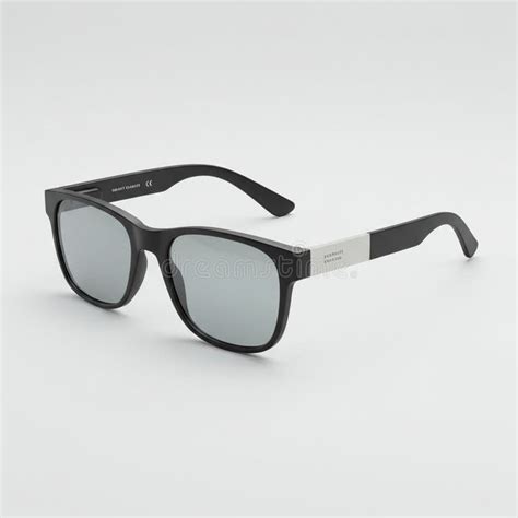 Black Rectangular Sunglasses With A Modern Design The Frame Is Sleek And Made Stock