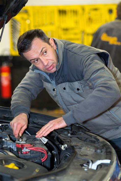 Man Fixing Car