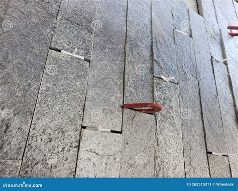 Red Shims For Tile Installation In The Wall Stock Image Image Of Worker Equipment 262515311