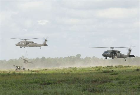 Sikorsky Uh 60 Blackhawk Helicopters Lower 119a3 Howitzer Picryl Public Domain Search