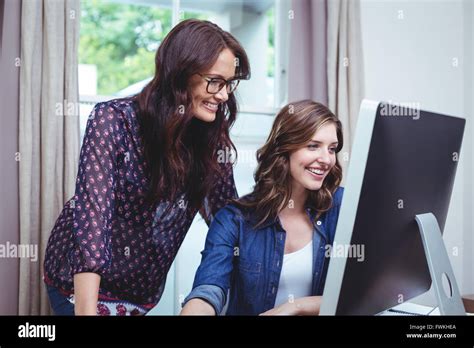 Two Beautiful Woman Using Computer Stock Photo Alamy