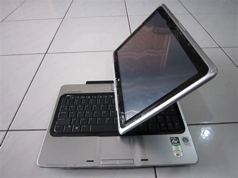 YL MANAGEMENT HP Pavilion TX1000