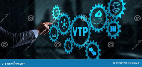 The Man Clicks On The Inscription VTP VLAN Trunking Protocol Stock