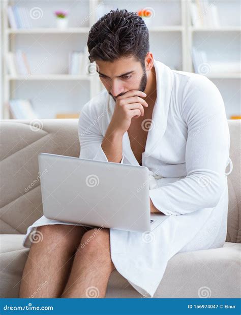 Young Man Freelancer Working From Home On A Laptop Stock Image Image