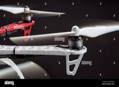 Rotating Propellers Of A Hexacopter Drone Against Black Background Rotating Propellers Of A Hexacopter Drone Against Black Background