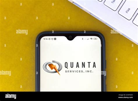 In This Photo Illustration The Quanta Services Logo Seen Displayed On A