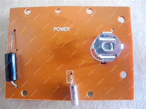 Premium Photo Miniature Lcd Panel On The Motherboard Detail Of An Electronic Printed Circuit