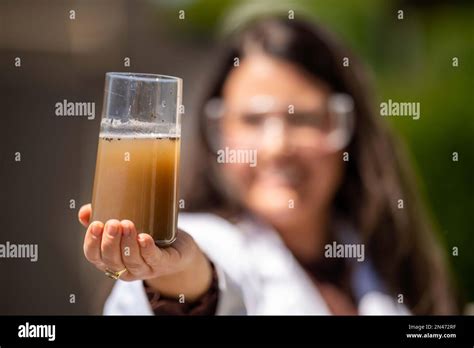 Soil Test Female Agricultural Scientist Conducting A Soil Test In A