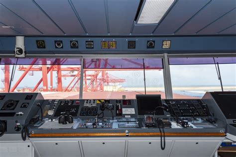 view of the control console on the navigational bridge of the cargo