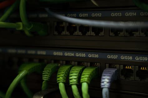 Close Up Of A Network Switch With Multiple Ethernet Cables Connected
