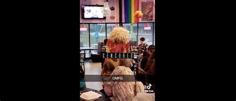 On Video Drag Queen Bouncing Gargantuan Fake Boobs Around Pauses To
