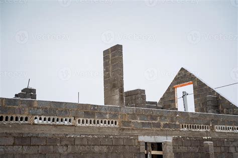 A New Building Is Currently Being Constructed Using Bricks Along With