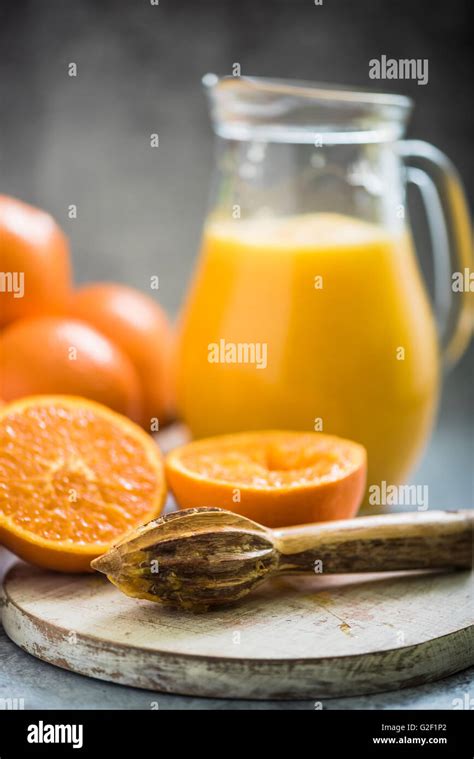 hand squeezed orange juice, haelthy diet concept Stock Photo - Alamy