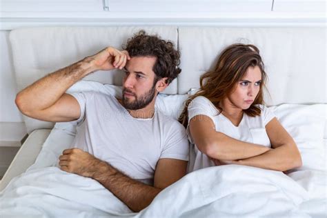Relationship Concept Top View Of Young Couple Lying On The Bed Couple Having A Fight In The