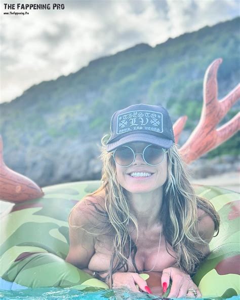 Heidi Klum Topless Having Fun In The Waves 8 Photos The Fappening