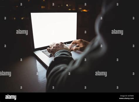 Hacker Using A Laptop Stock Photo Alamy