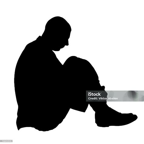 외로운 슬픈 남자는 다리를 집어 넣고 바닥에 앉아 우울증 스트레스 및 슬픔을 경험합니다 우울증 스트레스의 개념 실루엣에 대한