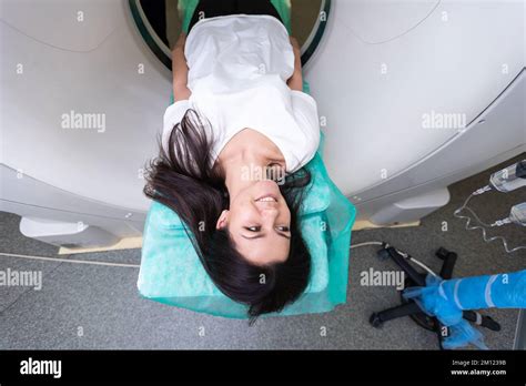 Beautiful Woman Lying On Ct Scanner Bed During Tomography Test In Hospital Stock Photo Alamy