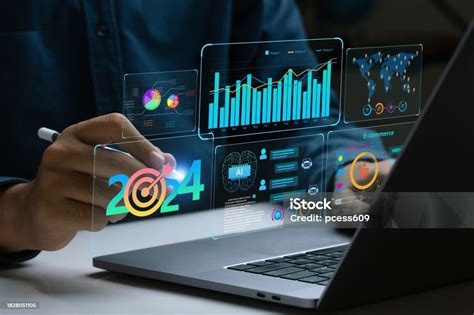 사업가는 노트북에서 작업 차트 메트릭 Ai 전자 상거래 Kpi가 포함된 2024년 비즈니스 동향 대시보드 표시 2024년 비즈니스 성장을 계획하는 분석 사업가 새해 미래